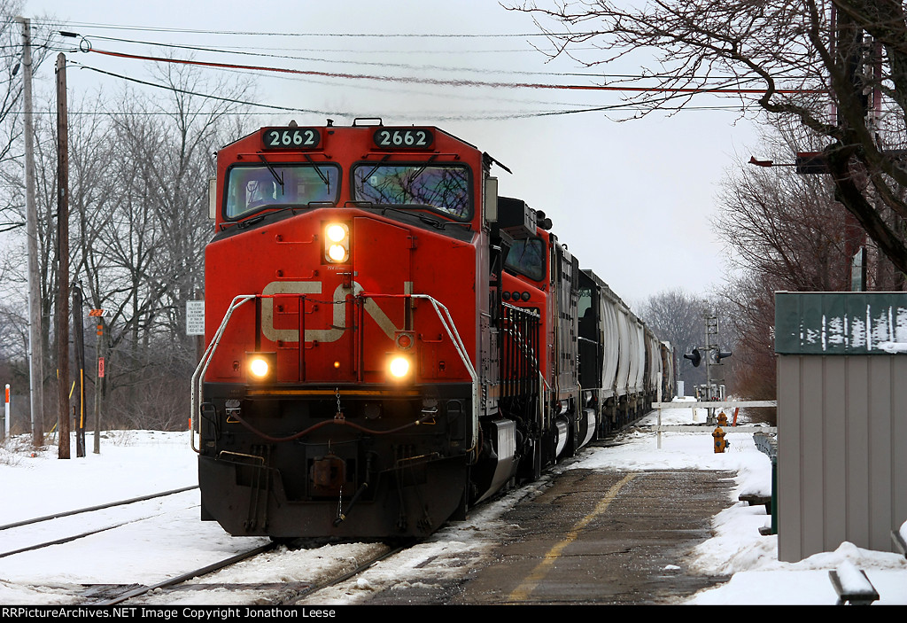 CN 2662 leads M397 across Harrison Rd.